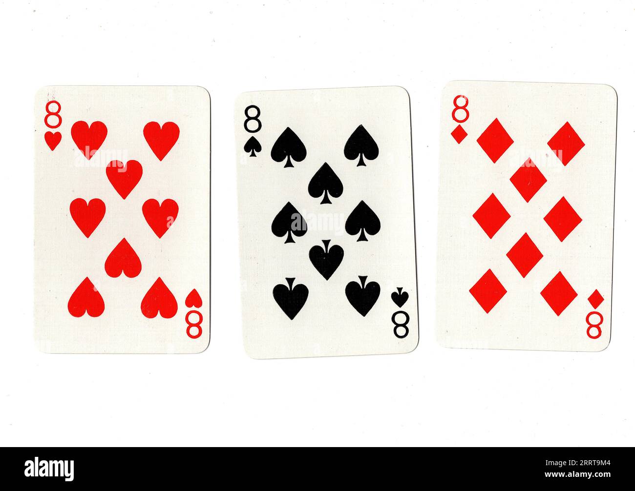 Vintage playing cards showing three eights on a white background Stock ...