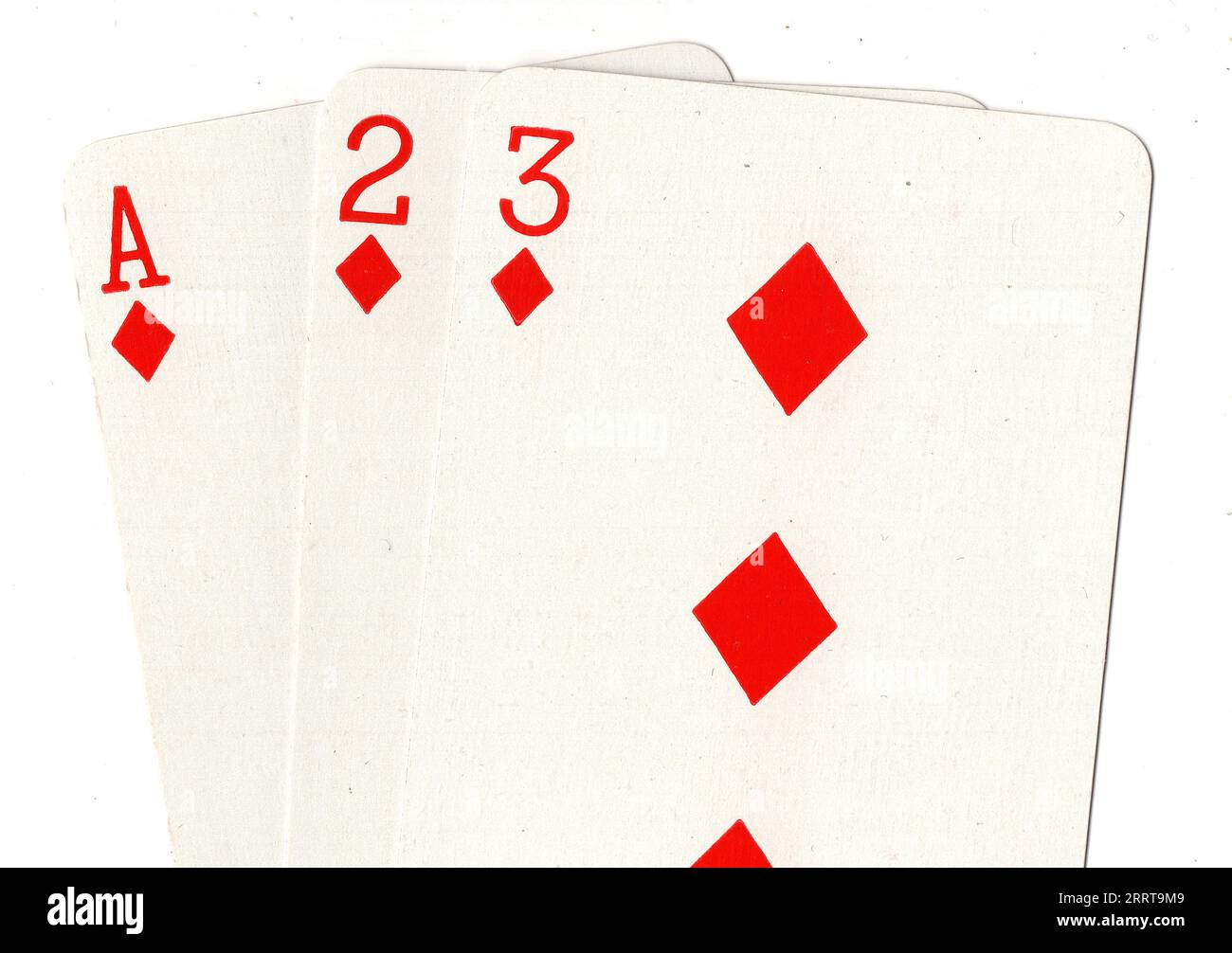 Vintage playing cards showing an ace, two and three of diamonds on a ...