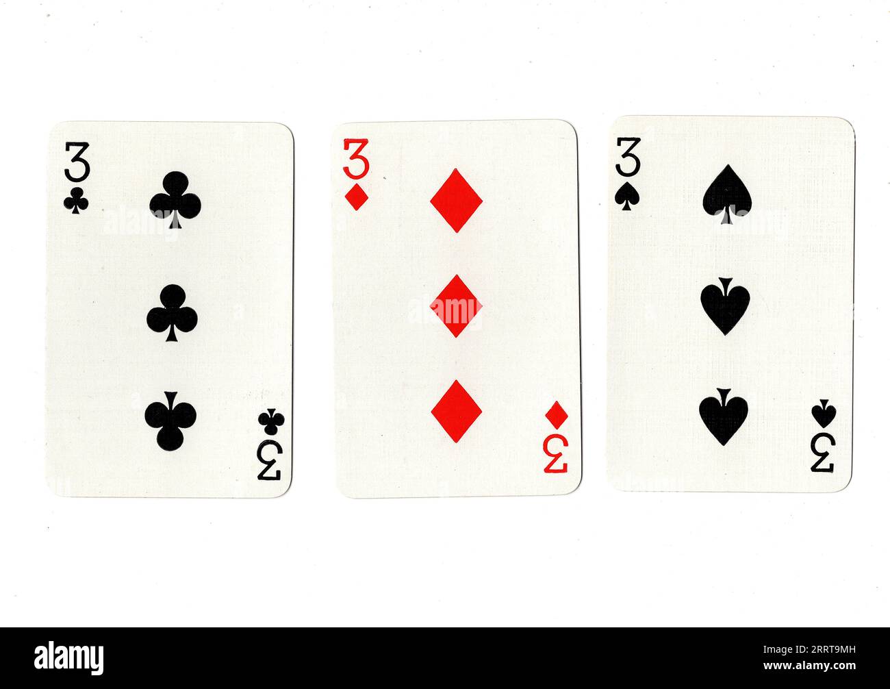 Vintage playing cards showing three threes on a white background Stock ...