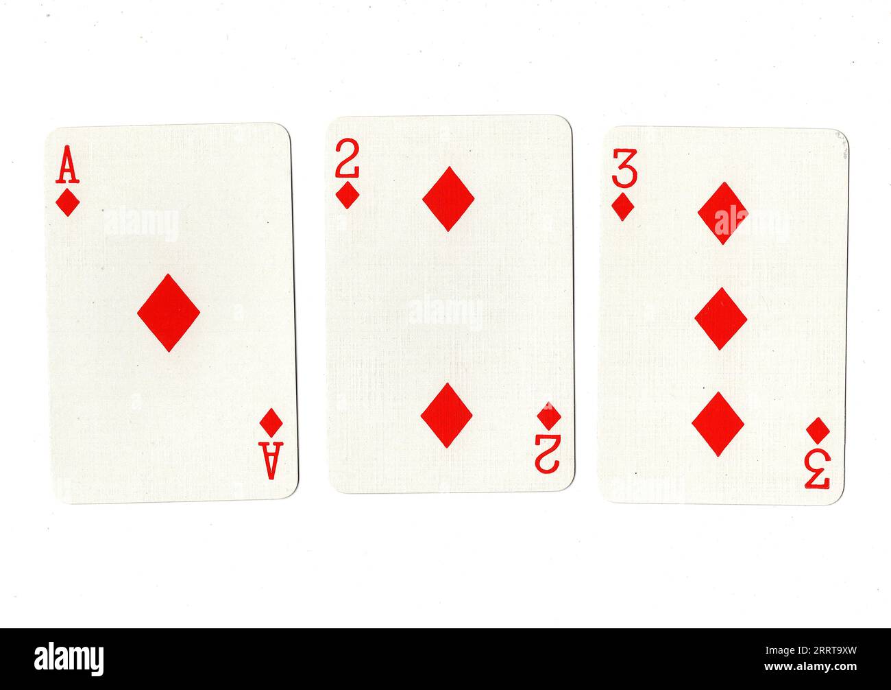 Vintage playing cards showing an ace, two and three of diamonds on a ...