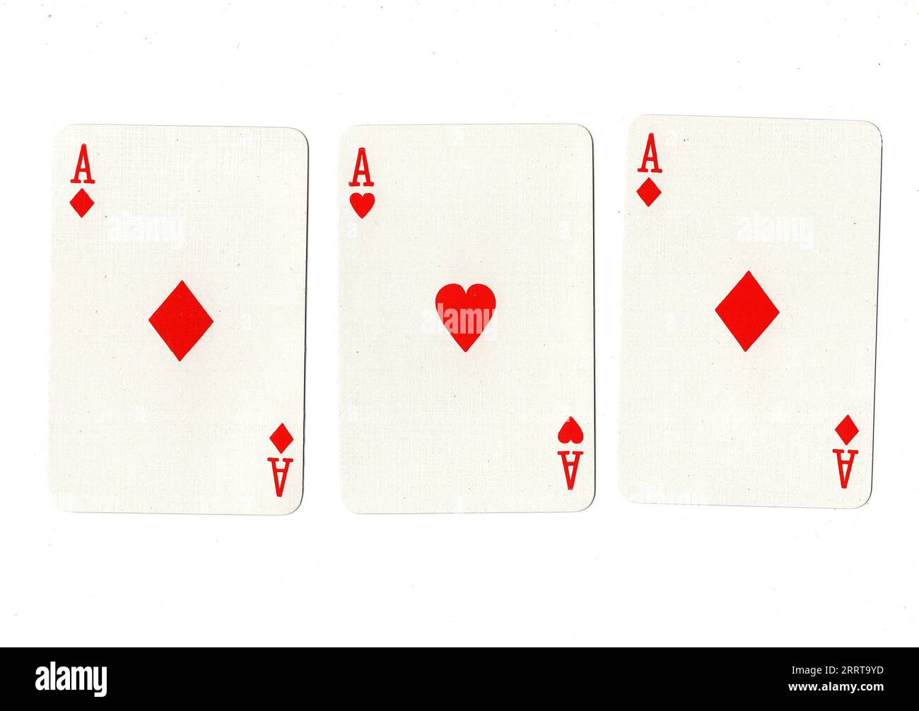 Vintage playing cards showing three aces on a white background Stock ...