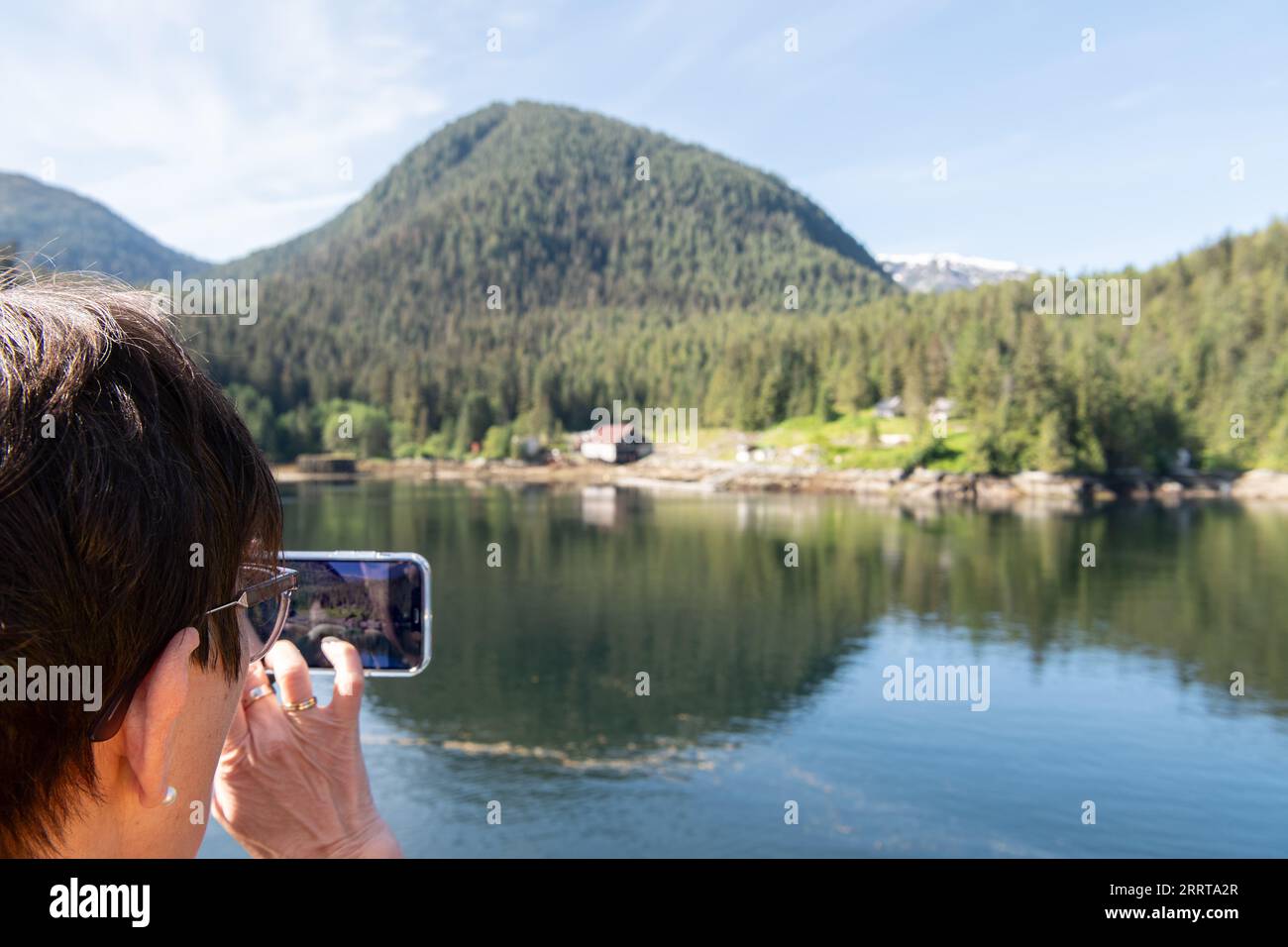 Tourist taking Mobil Phone picture of Butedale ghost town on Princess ...