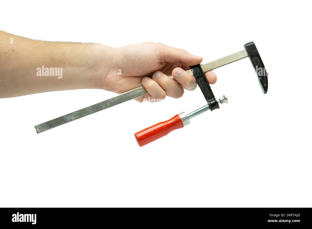 Male hand holding metal screw clamp isolated on white background Stock ...