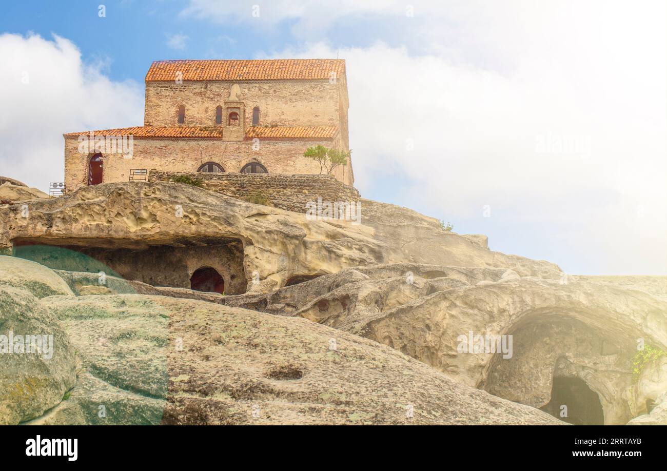 The Old stone walls of the Orthodox Church and cave of Uplestsikhe in ...