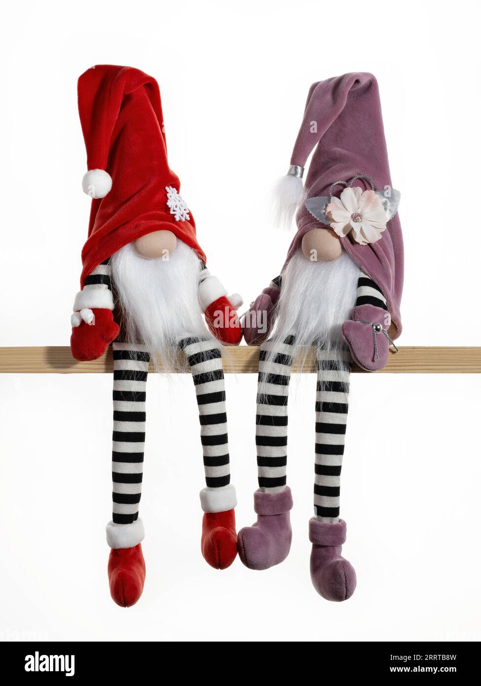 Christmas gnomes isolated. Christmas gnomes is sitting Stock Photo - Alamy