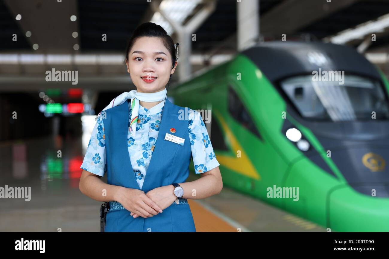 230718 -- MENGLA, July 18, 2023 -- Yi Bofeng poses for a photo at the ...