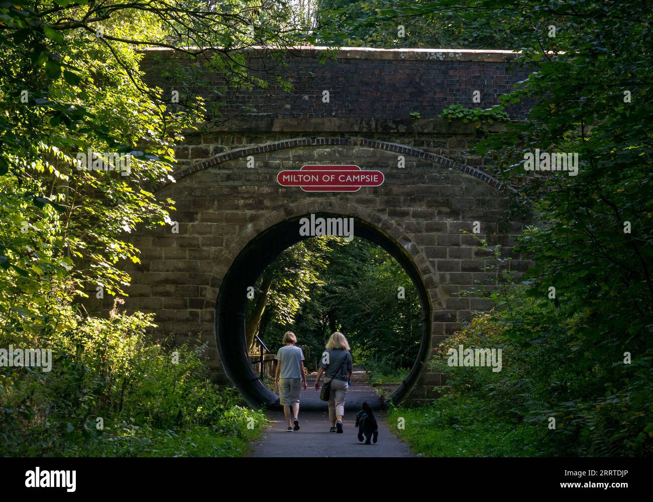 Women walking on Strathkelvin Railway path, Milton of Campsie, East ...