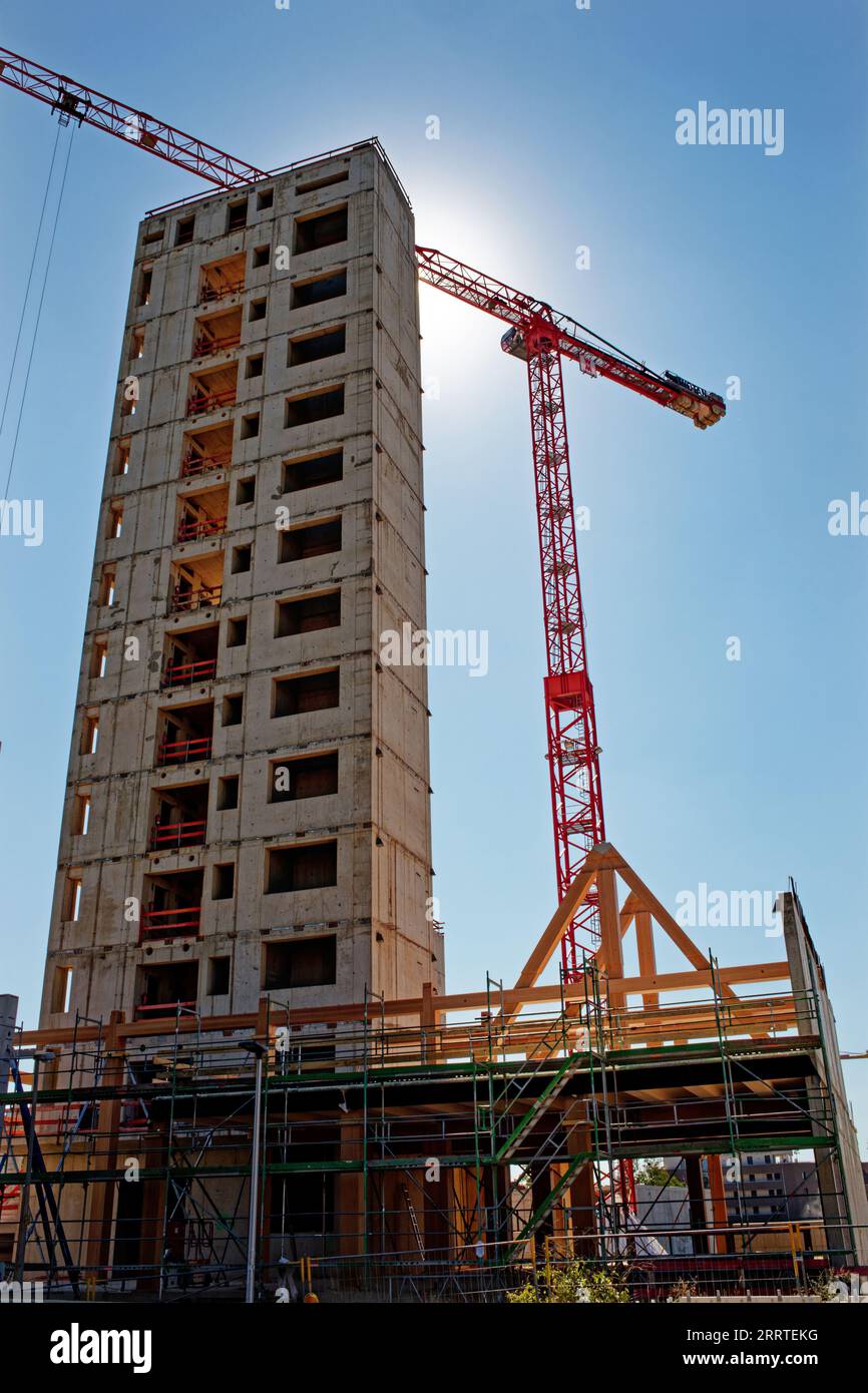 Construction Industry, Half Finished Shell Of A Building With Crane ...