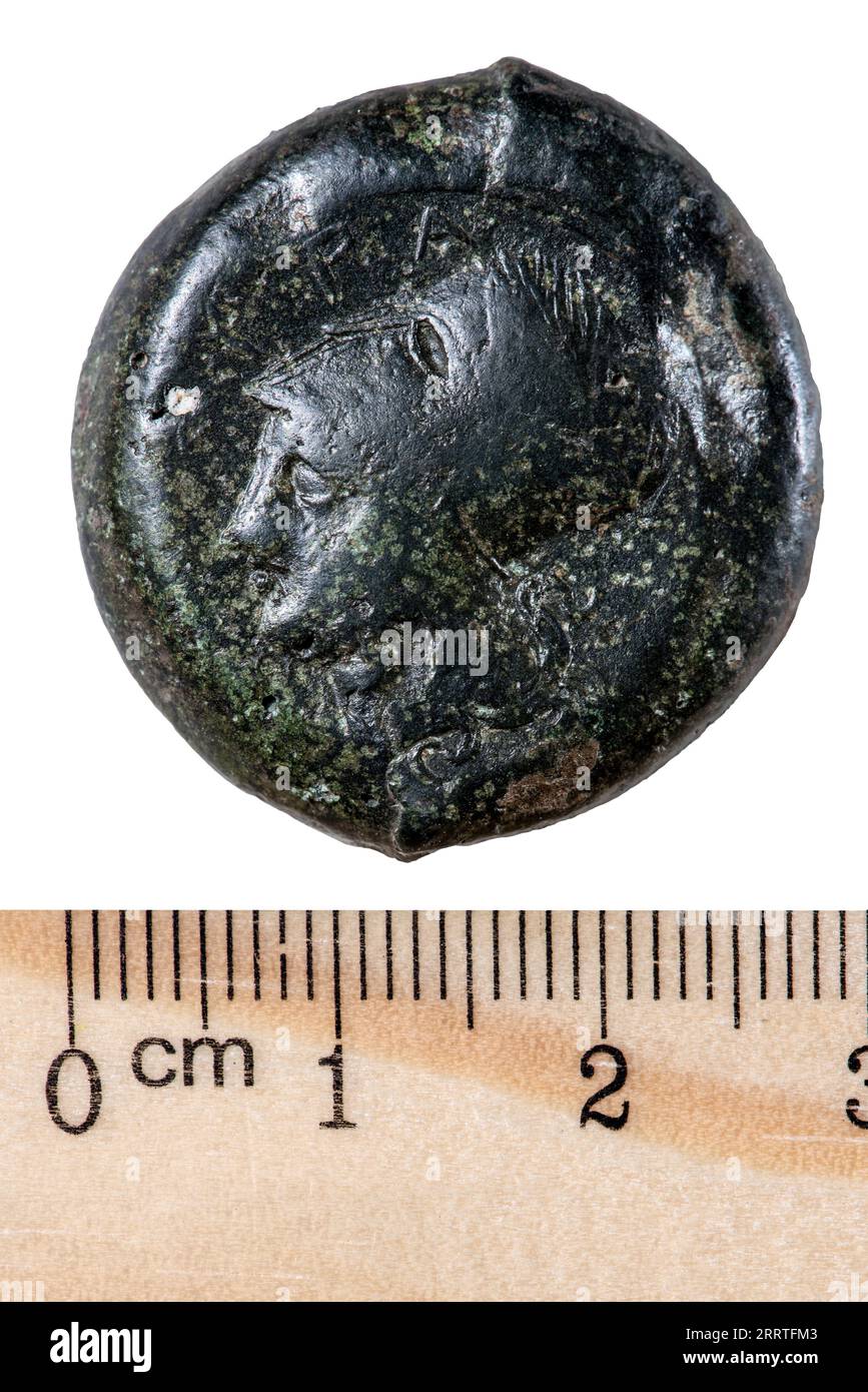 Ancient Greek Drachma copper coin with the image of Dionysus I and two ...