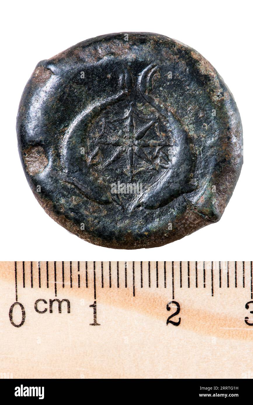 Ancient Greek Drachma copper coin with the image of Dionysus I and two ...