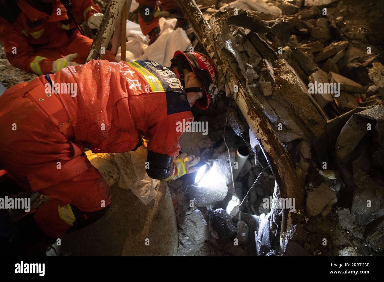 230724 -- QIQIHAR, July 24, 2023 -- Rescuers work at the site of a ...