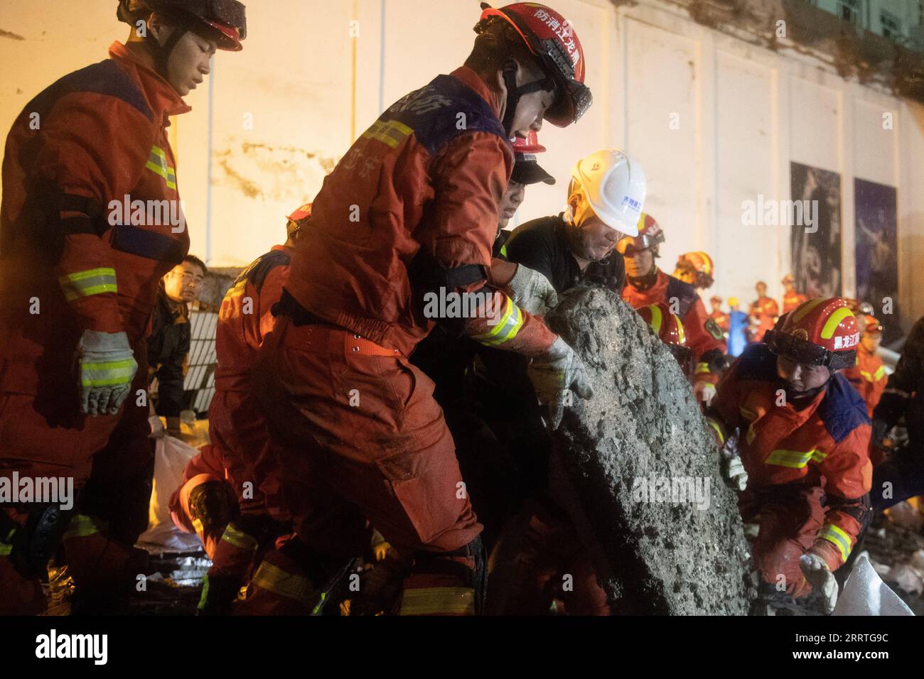 230724 -- QIQIHAR, July 24, 2023 -- Rescuers work at the site of a ...
