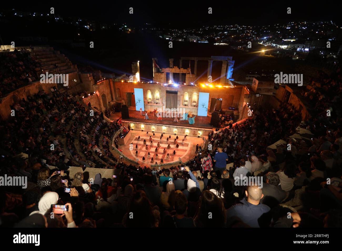 230727 -- JERASH, July 27, 2023 -- People watch a show at a theater of ...