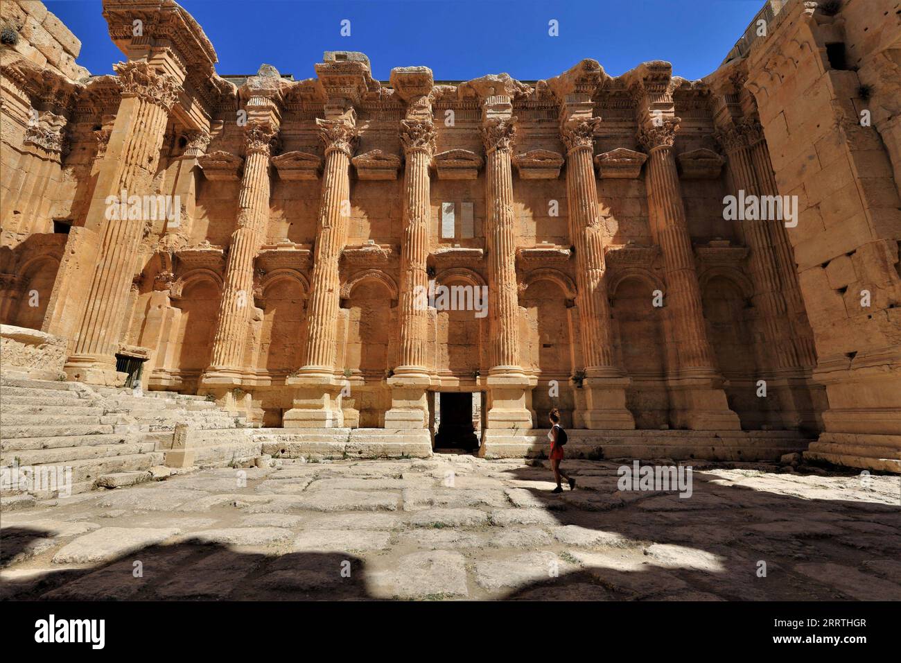 230727 -- BEIRUT, July 27, 2023 -- A tourist visits the Baalbek temple ...
