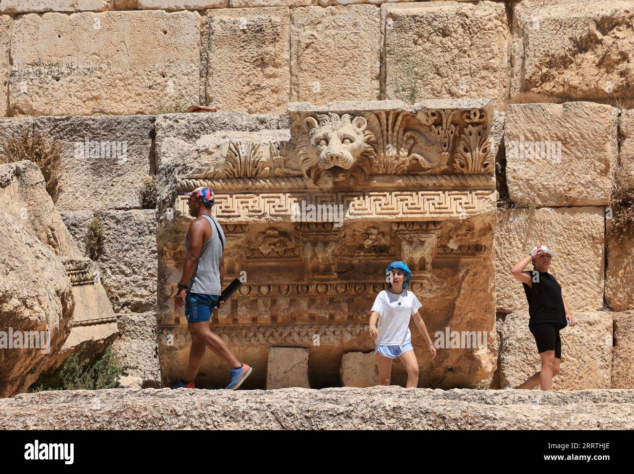 230727 -- BEIRUT, July 27, 2023 -- Tourists visit the Baalbek temple ...
