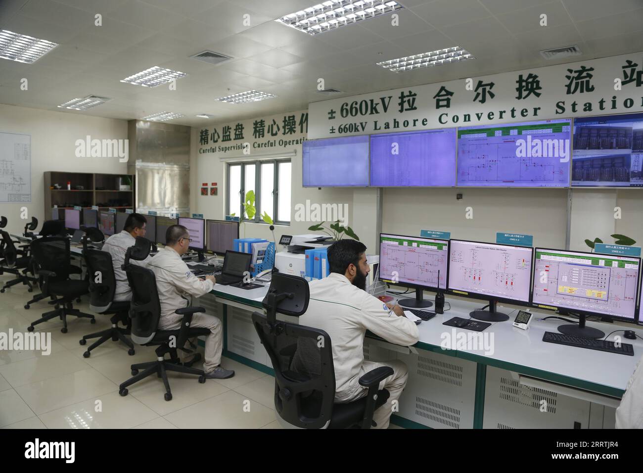 230728 -- LAHORE, July 28, 2023 -- Zubair Tufail R works in the control ...