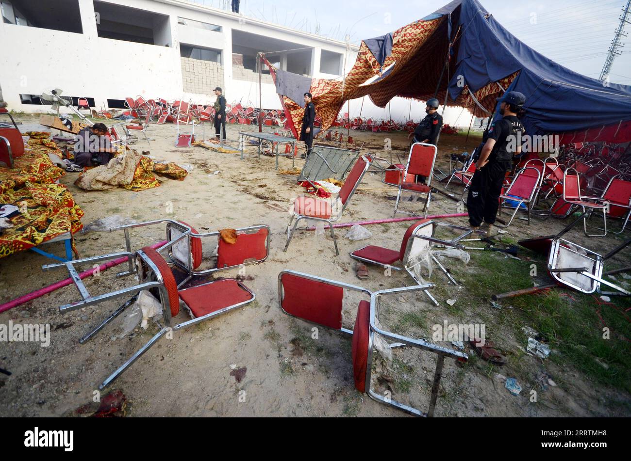 230731 -- BAJAUR PAKISTAN, July 31, 2023 -- Security personnel inspect ...
