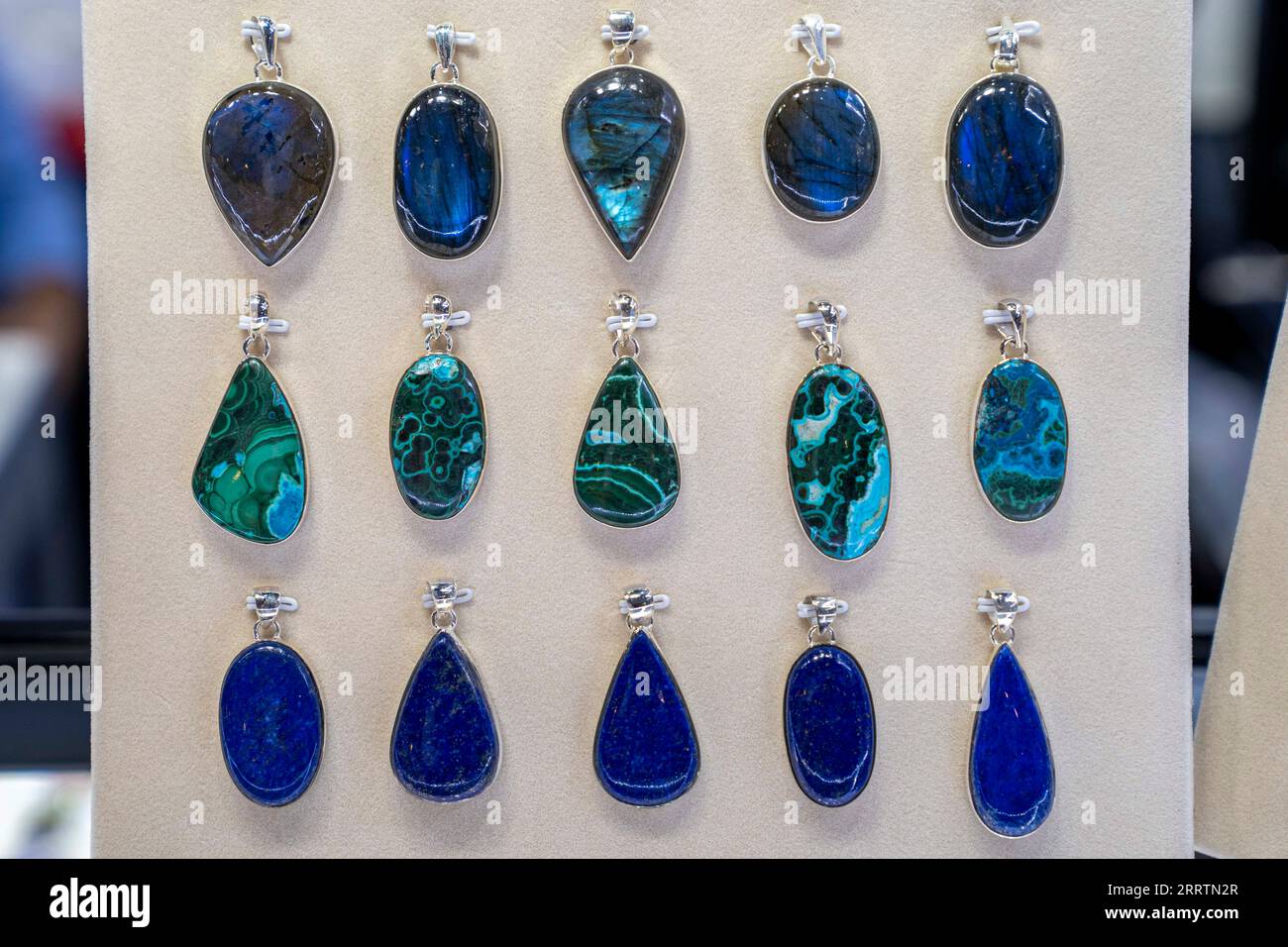 Bangkok, Bangkok, Thailand. 9th Sep, 2023. A rack of earrings inlaid with semiprecious stones on ...