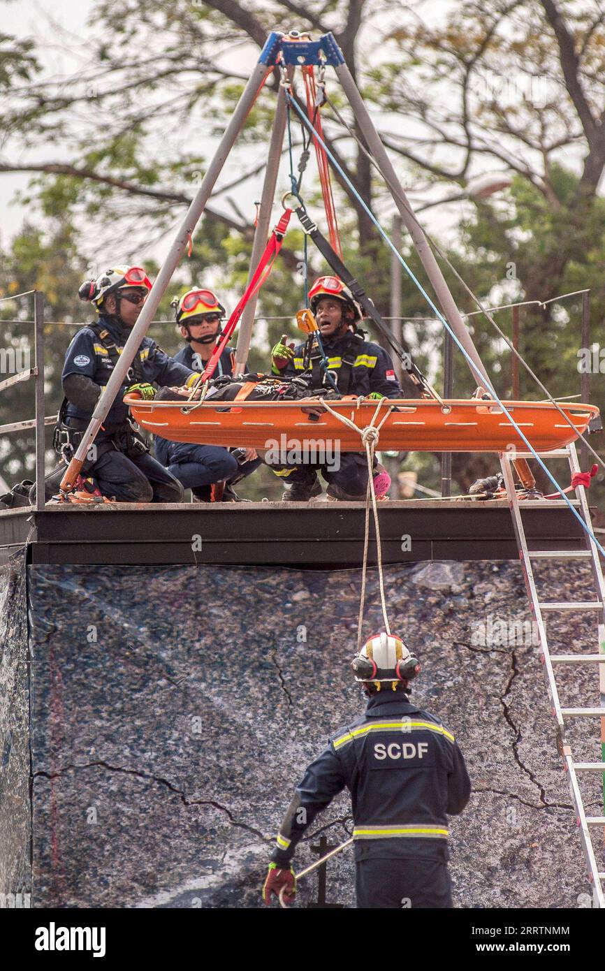 230803 -- YOGYAKARTA, Aug. 3, 2023 -- Staff members of Singapore Civil ...