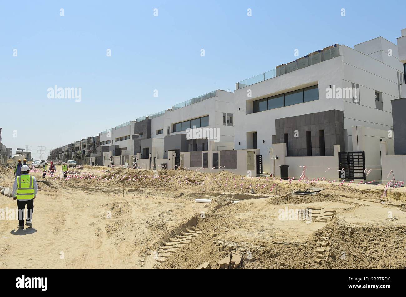 230807 -- AHMADI GOVERNORATE, Aug. 7, 2023 -- Workers are seen at the ...