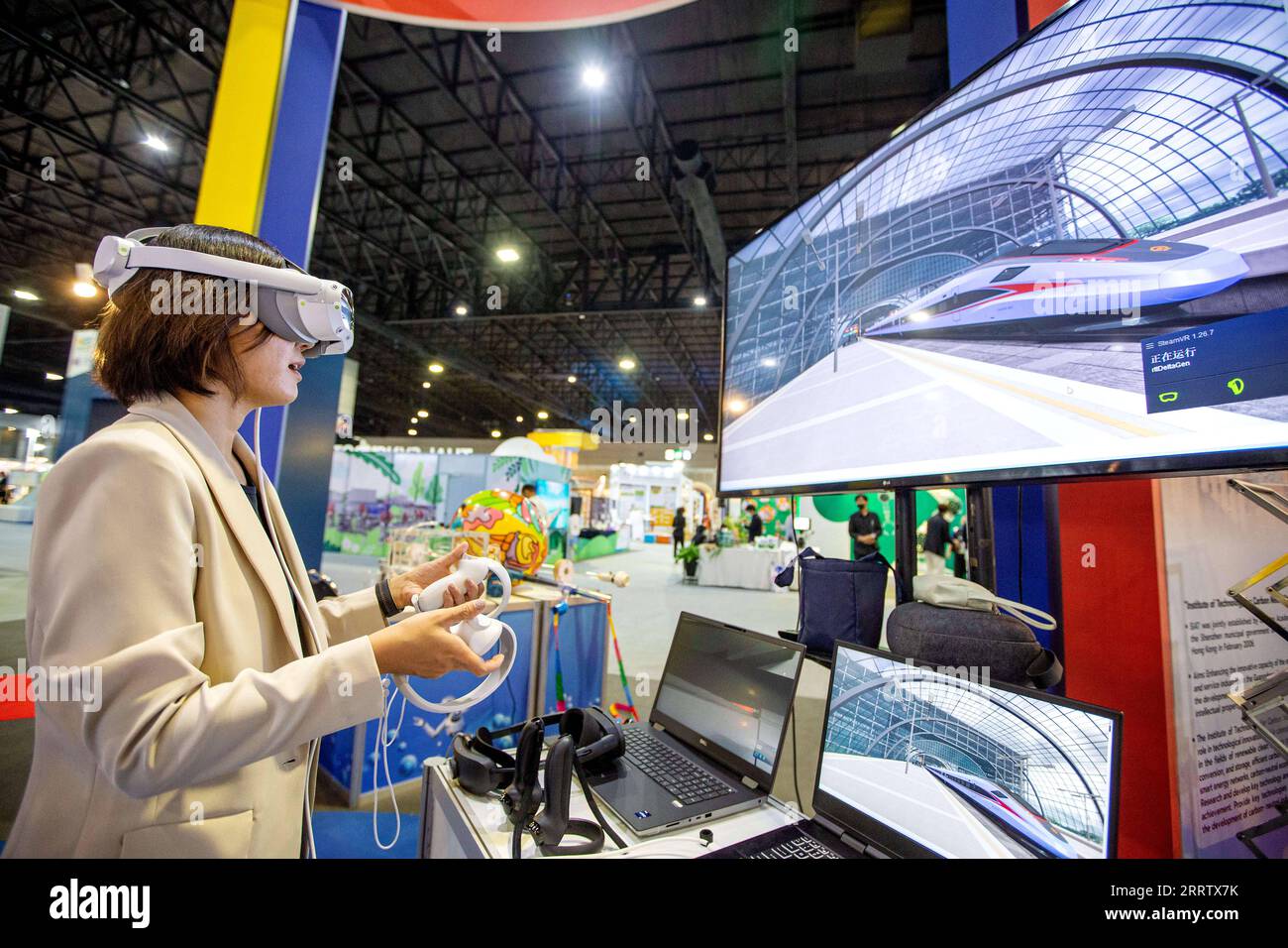 230812 -- BANGKOK, Aug. 12, 2023 -- A visitor experiences a VR ...