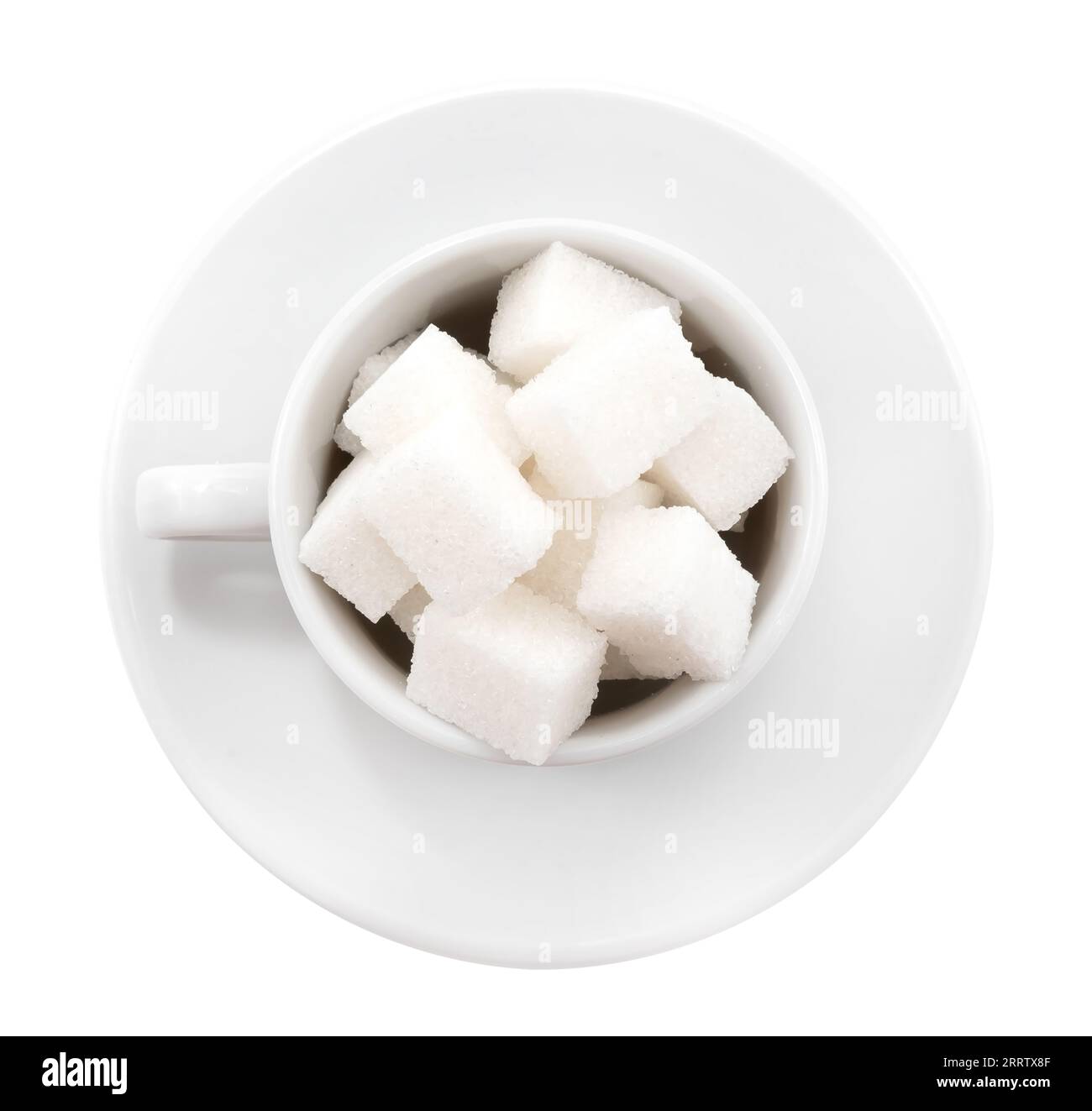 Coffee cup with sugar cubes on a white background. View from above ...