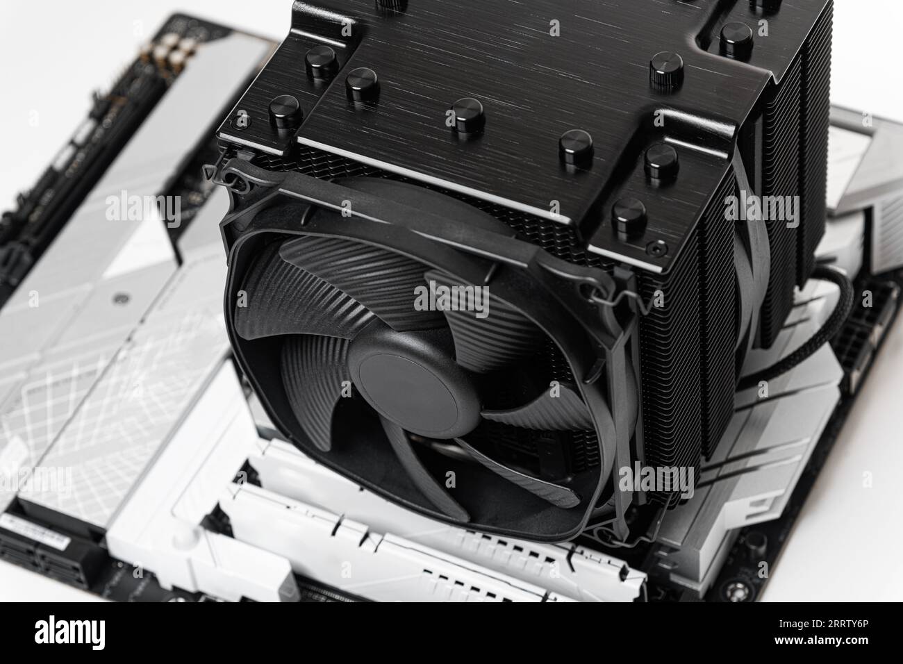 Installing a large cooler on a computer processor Stock Photo - Alamy