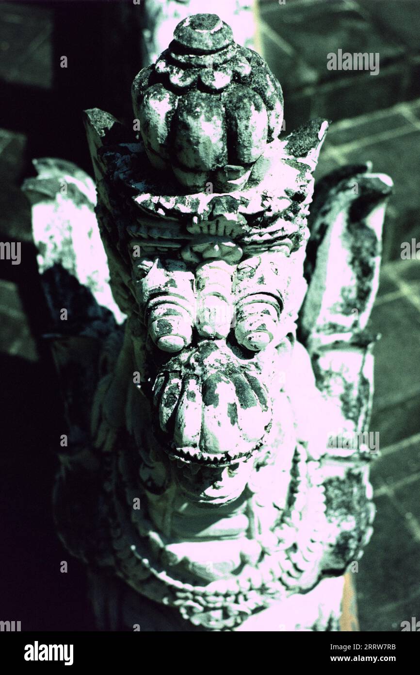 Carvings of a god in a traditional Balinese temple Stock Photo - Alamy