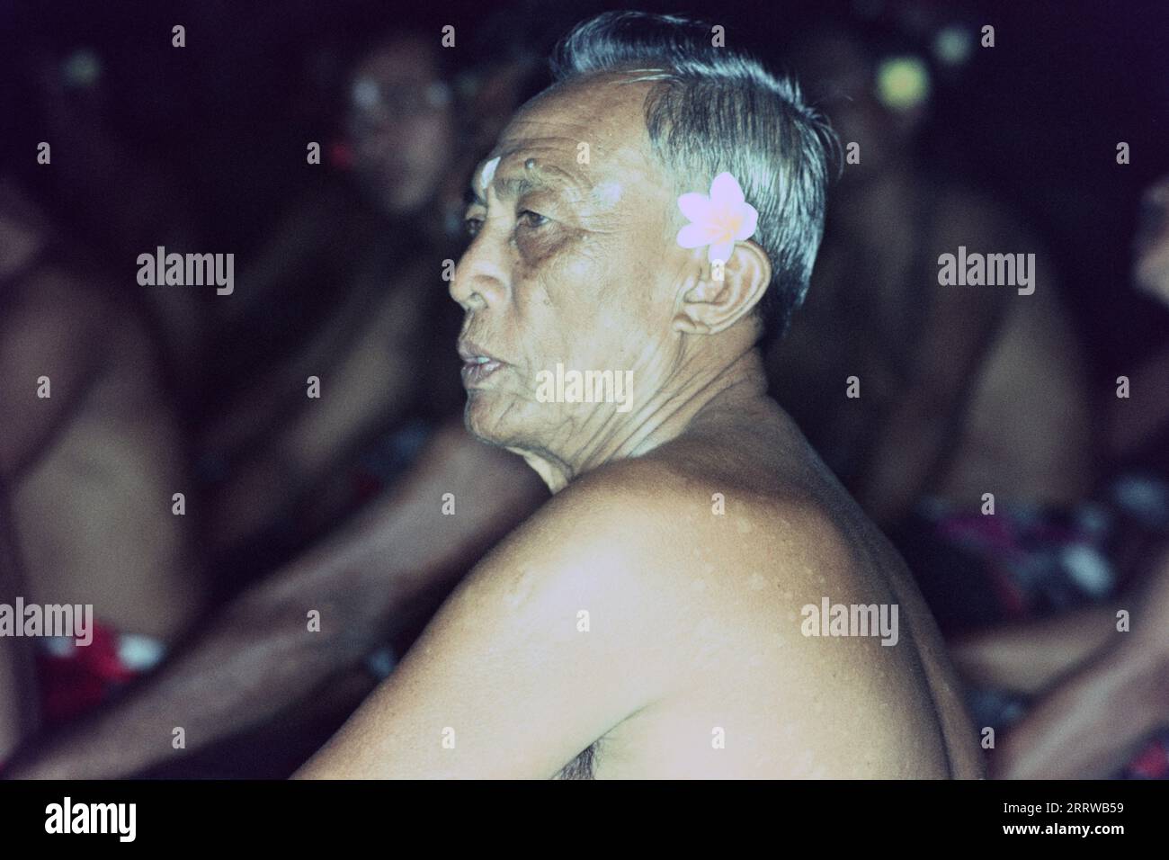 Group of Balinese villagers gathered at night during ceremony Stock ...