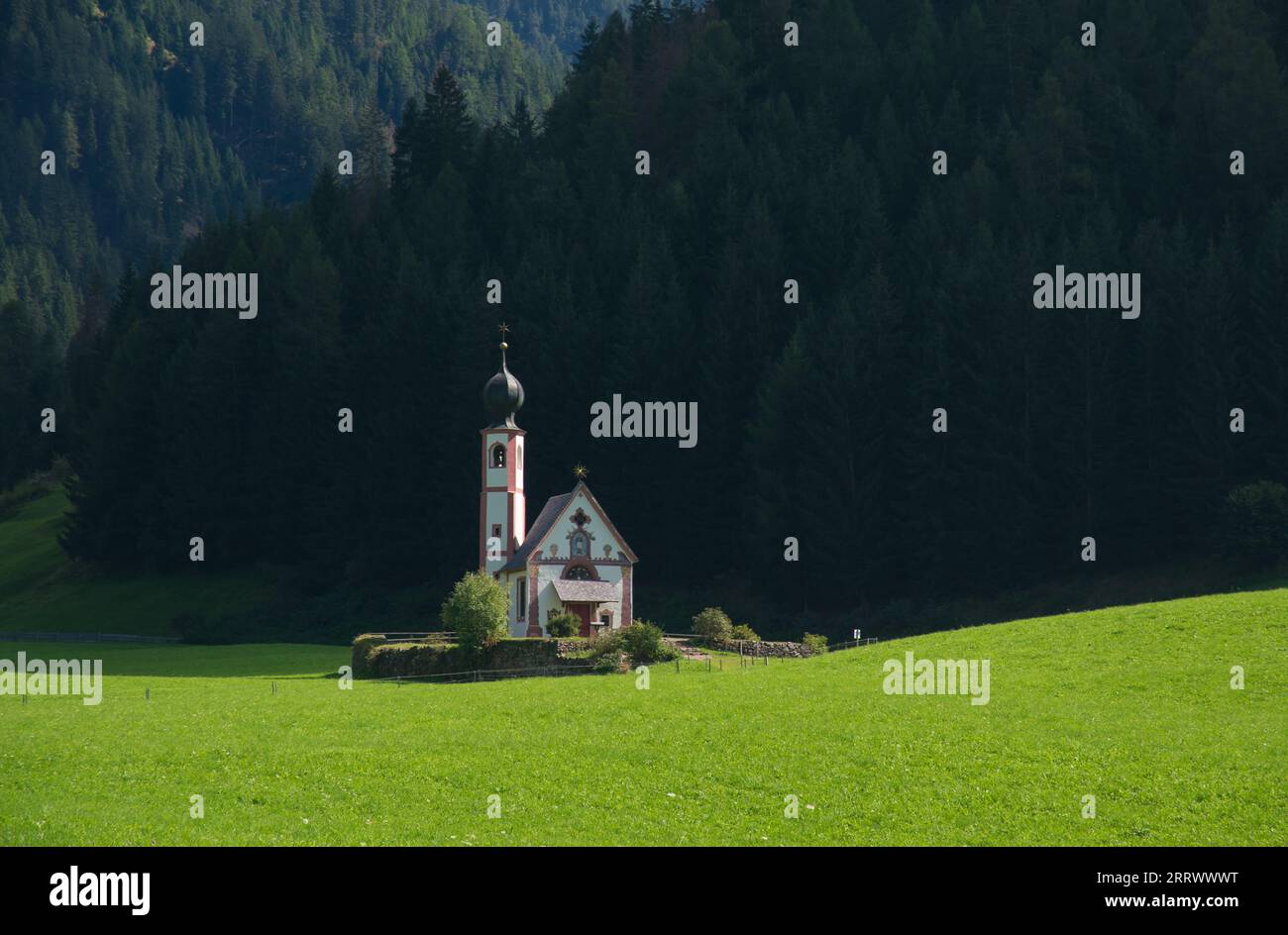 Magnificent Santa Maddalena village with old St. Johann church in the ...