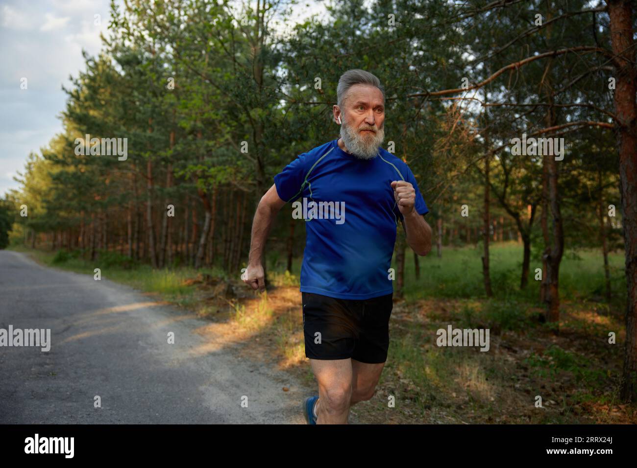 Older man running marathon hi-res stock photography and images - Alamy