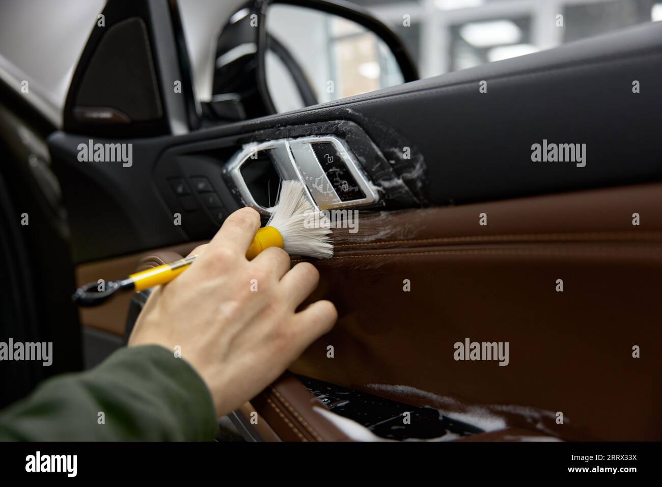 Automotive fittings cleaning inside car process closeup Stock Photo - Alamy