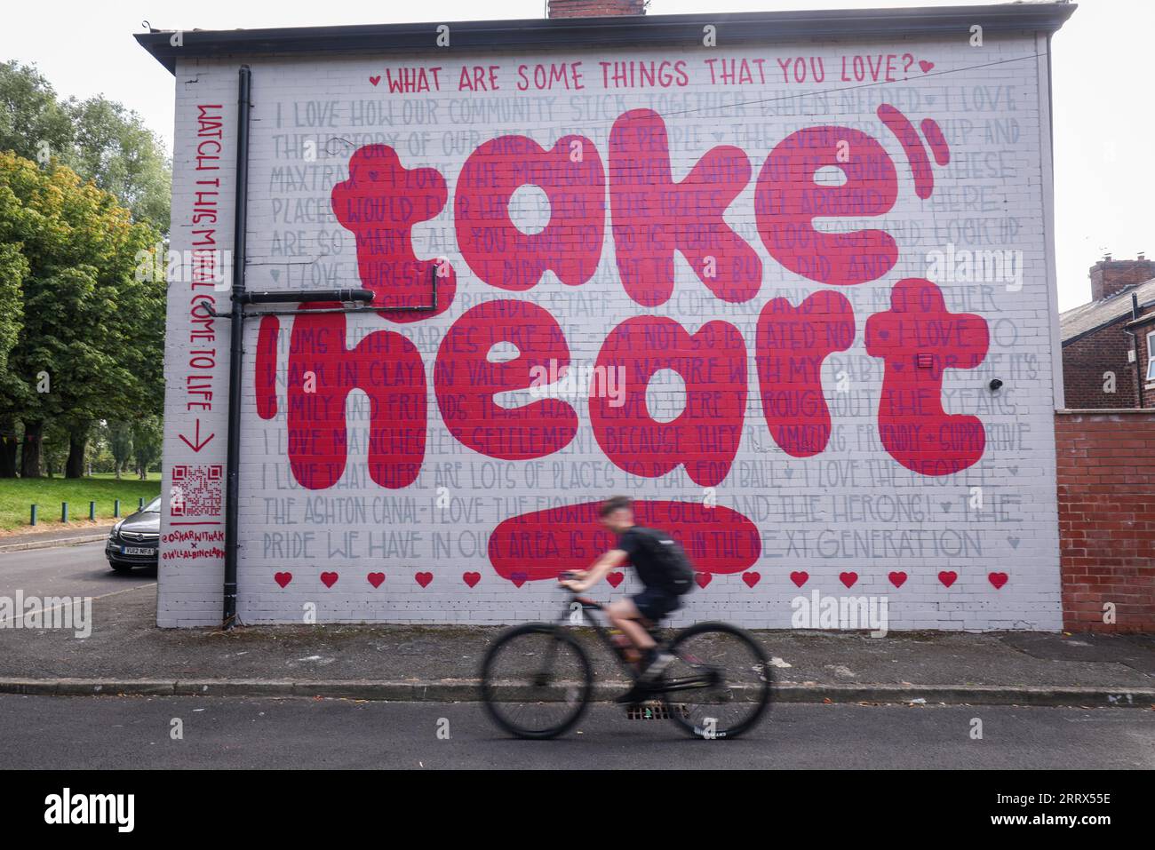 EDITORIAL USE ONLY A member of public in front of a new mural in ...