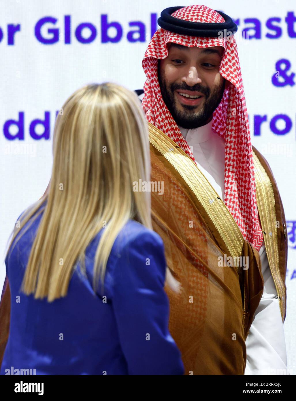 Italian Prime Minister Giorgia Meloni, left, and Saudi Arabian Crown Prince Mohammed bin Salman ...