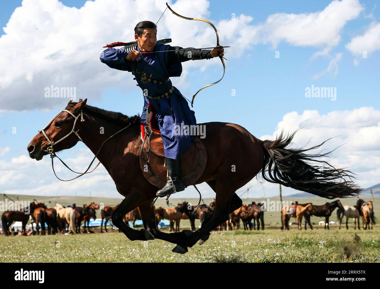 230822 -- ULAN BATOR, Aug. 22, 2023 -- A horseman performs riding and ...