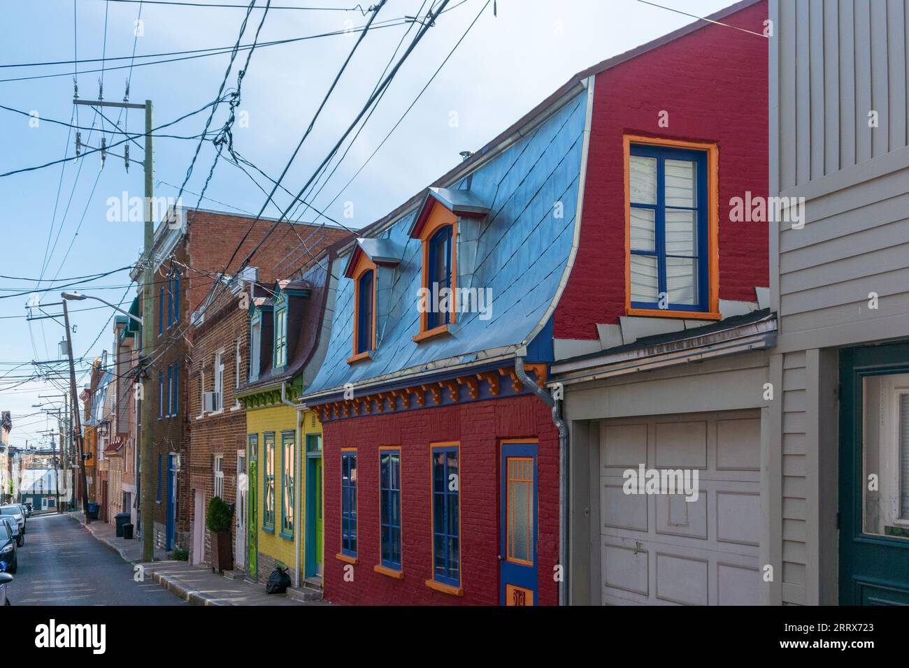 Colored buildings on a road Stock Photo - Alamy