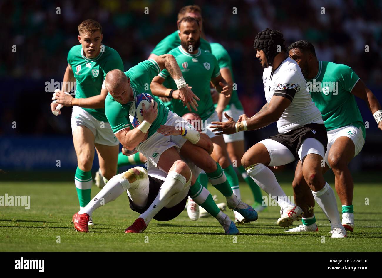 Ireland's Keith Earls is tackled by Romania's Florian Rosu during the ...