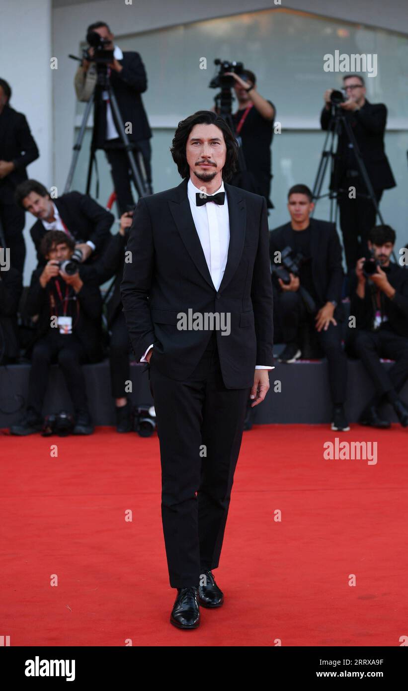230831 -- VENICE, Aug. 31, 2023 -- Actor Adam Driver poses on the red ...