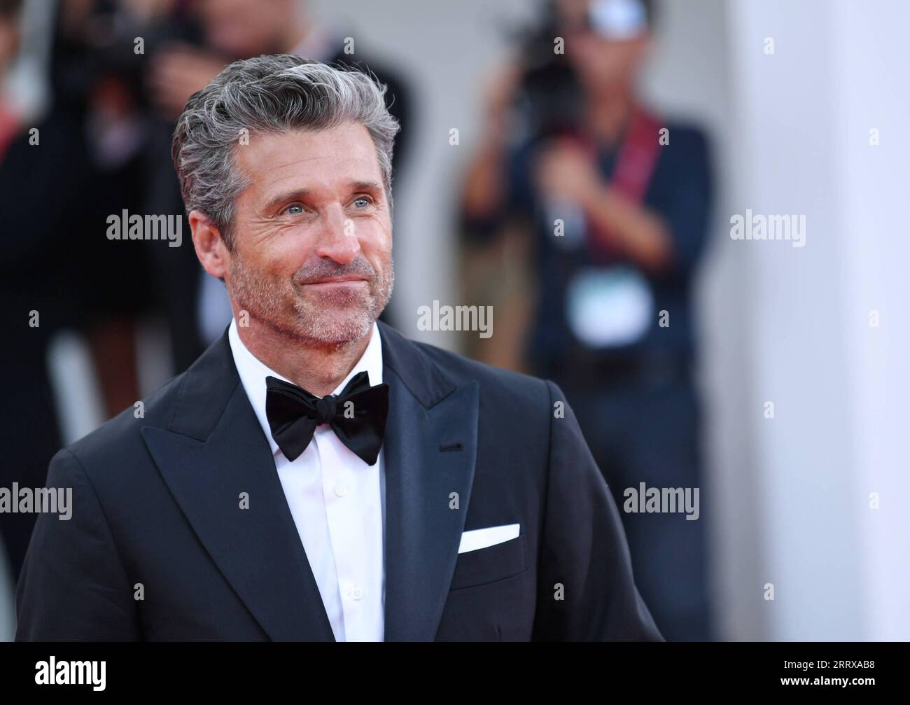 230831 -- VENICE, Aug. 31, 2023 -- Actor Patrick Dempsey poses on the ...