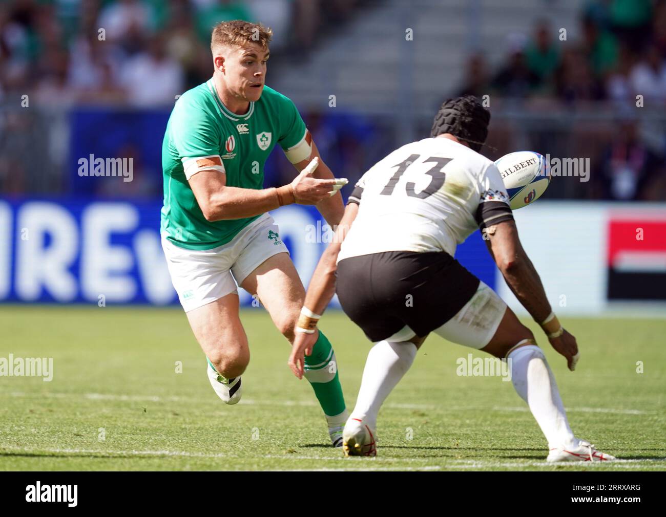 Ireland's Garry Ringrose (left) and Romania's Jason Tomane during the ...