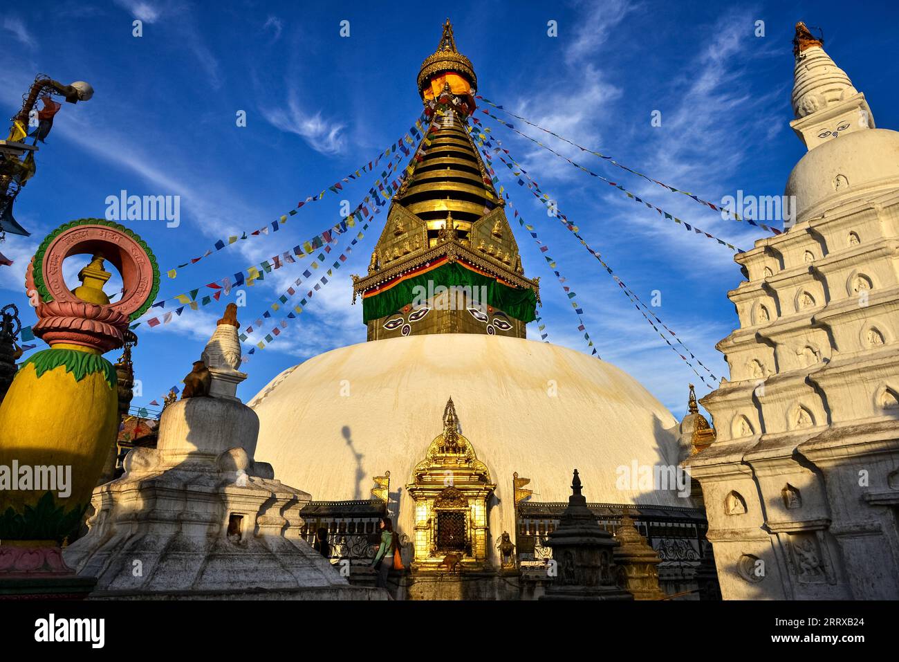 Strolling around the Swayambhunath stupa and smaller pagodas in ...