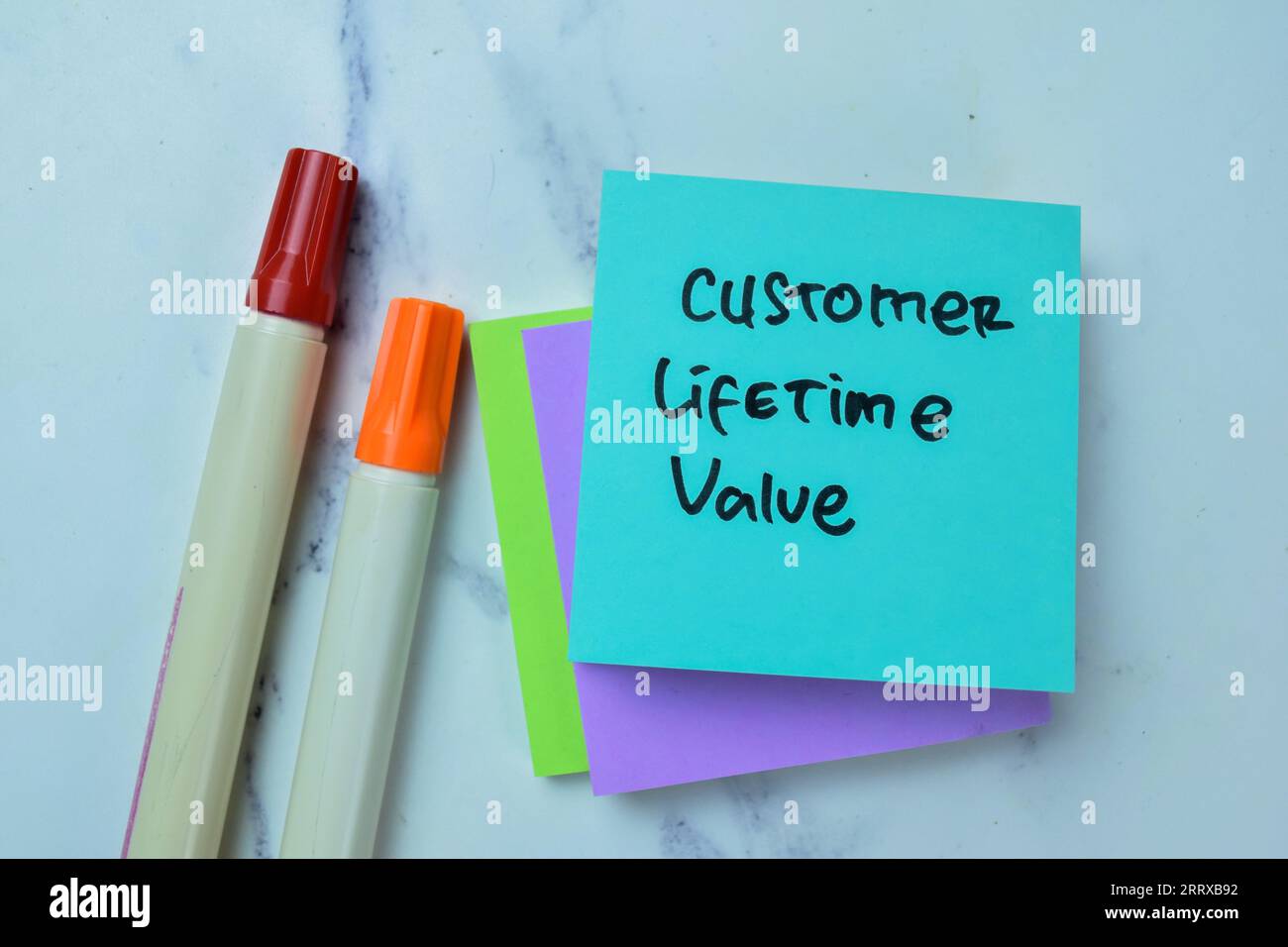 Concept of Customer Lifetime Value write on sticky notes isolated on ...