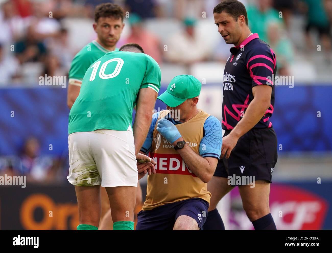 Ireland's Johnny Sexton receives treatment for an injury, which was ...
