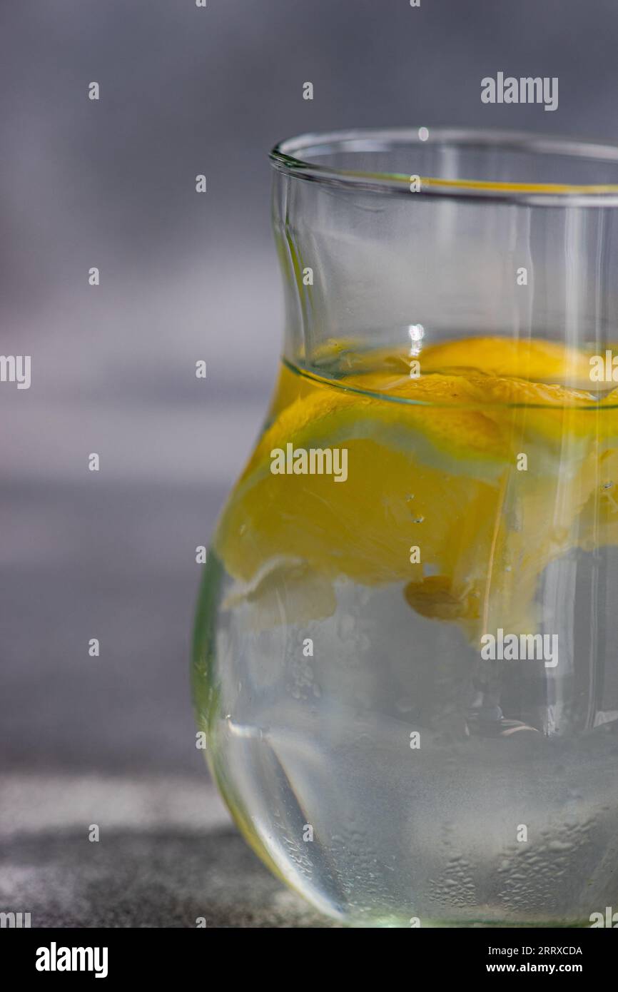 Pure water with organic lemon slice in the glass Stock Photo - Alamy