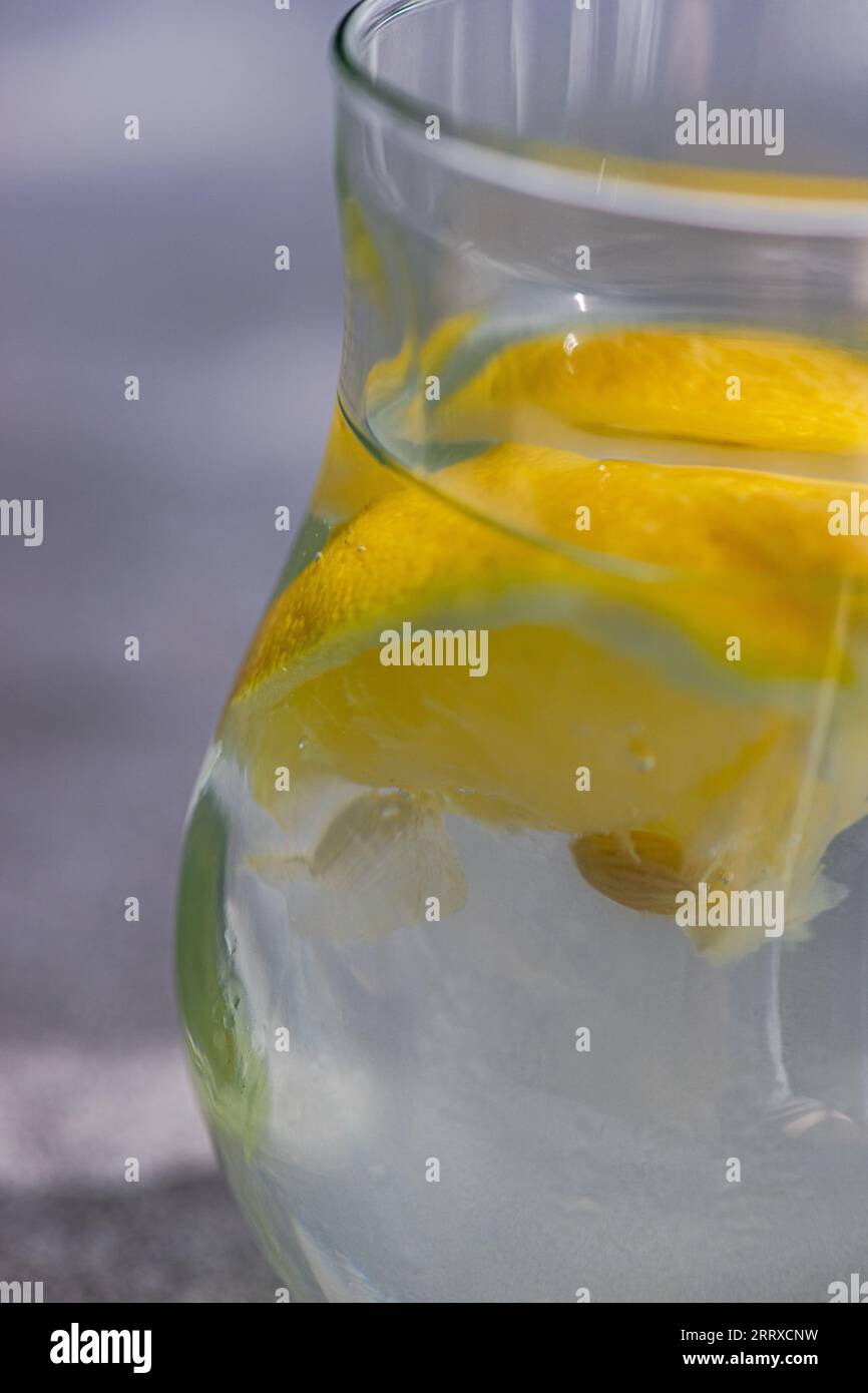 Pure water with organic lemon slice in the glass Stock Photo - Alamy
