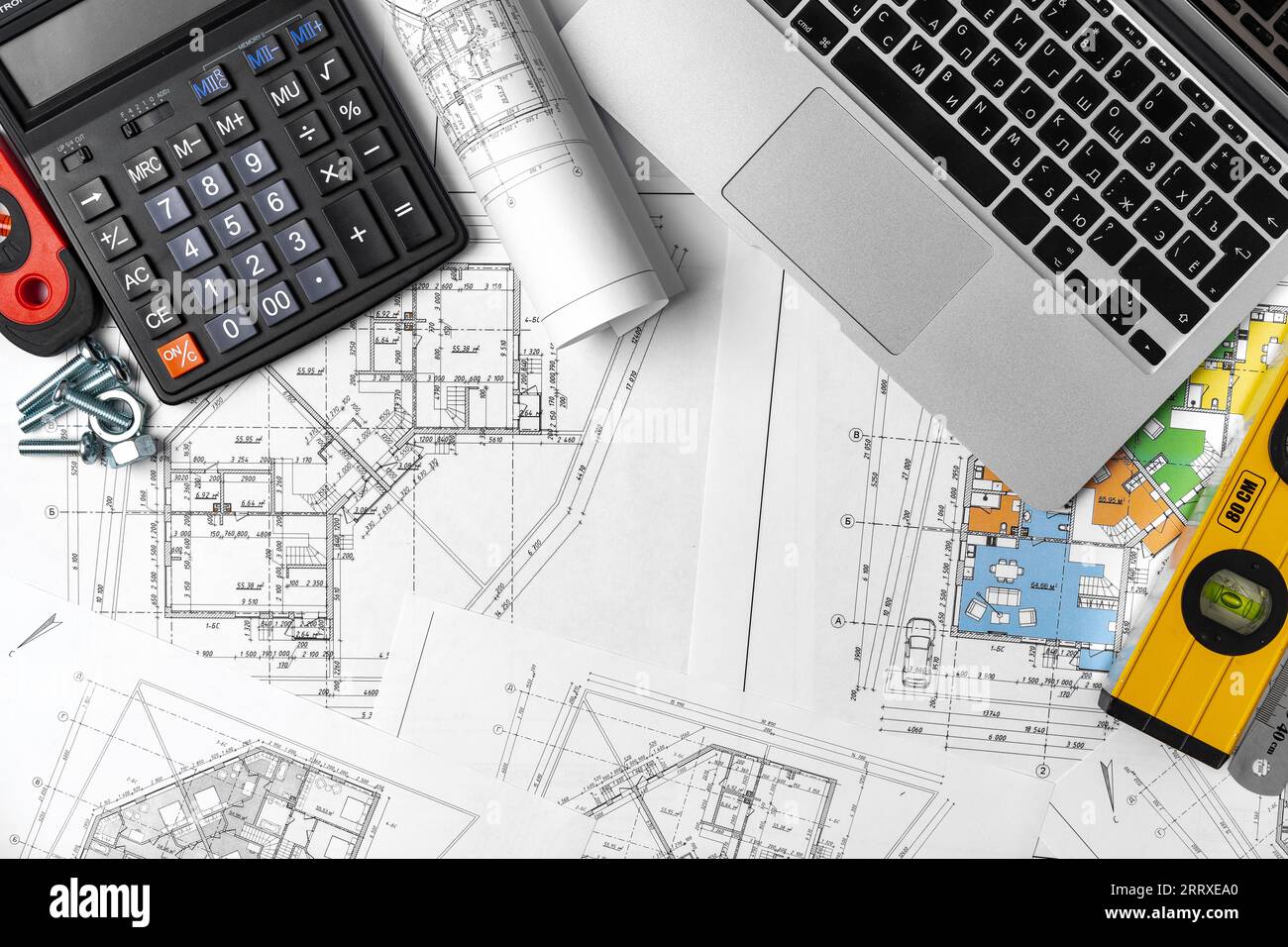 Working table of interior designer with blueprint and laptop Stock ...
