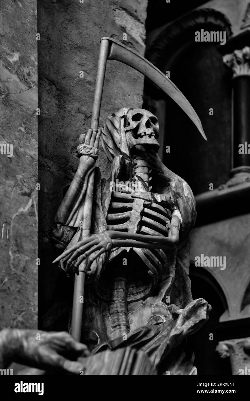 Sculpture of a devil holding a sickle in Trier Cathedral (High ...