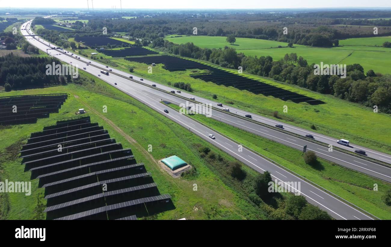 Aerial view on the A7 motorway in northern Germany between fields and ...
