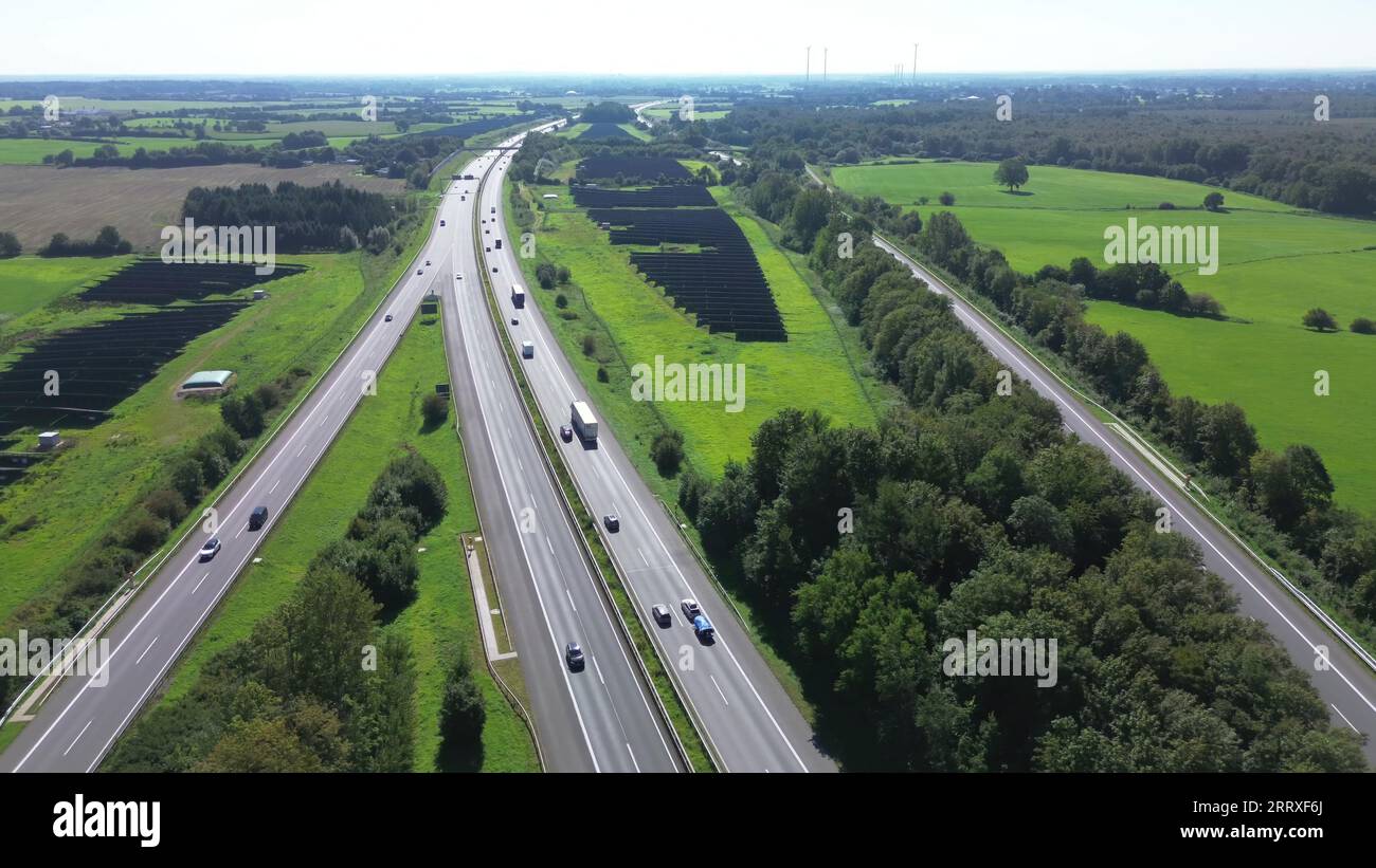 Aerial view on the A7 motorway in northern Germany between fields and ...