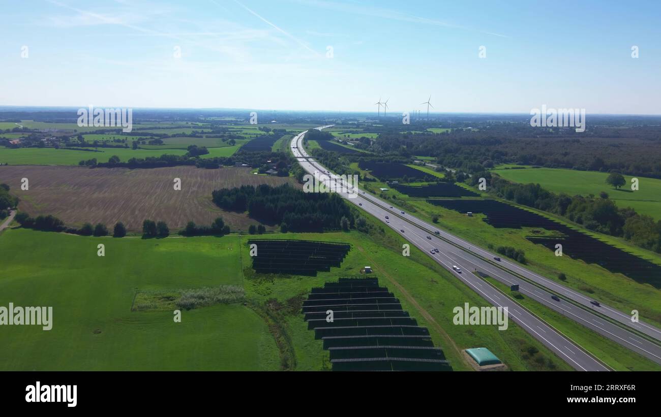 Aerial view on the A7 motorway in northern Germany between fields and ...